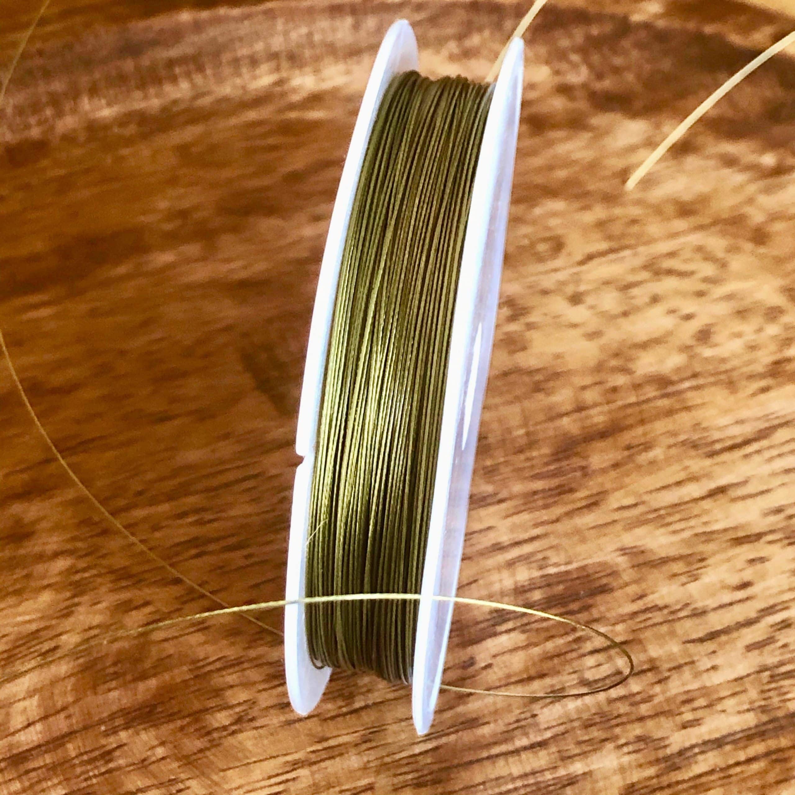 Fil Cablé Doré 0,38mm – Stones Boutique